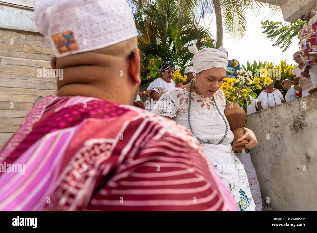 Candomblé members gathered in traditional clothing at the religious ...