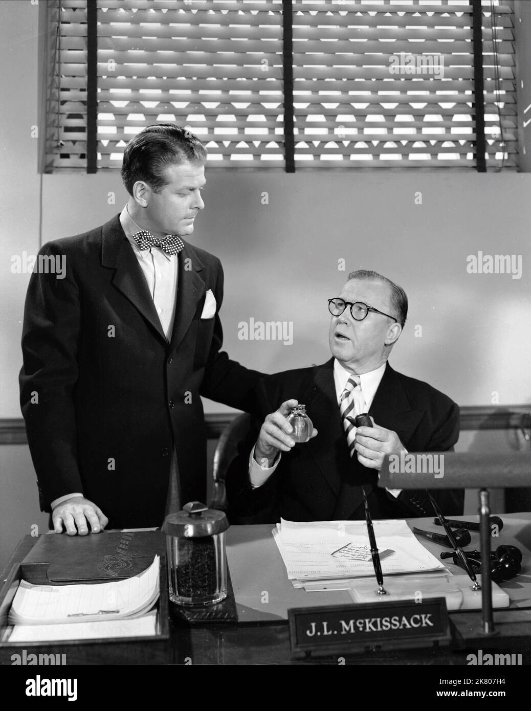 Don Mcguire & Harry Hayden Film: Double Dynamite (1951) Characters: R.B ...