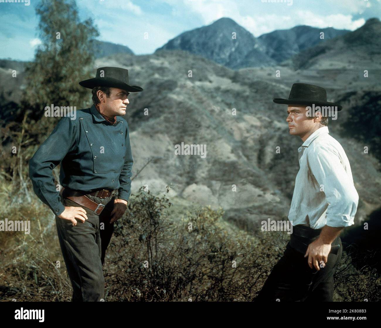 Gregory Peck & Barry Coe Film: The Bravados (1958) Director: Henry King ...