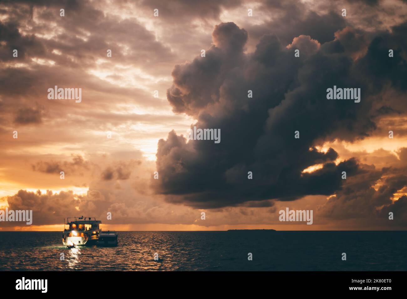 A late evening seascape with a stunning golden hour sky with dramatic ...