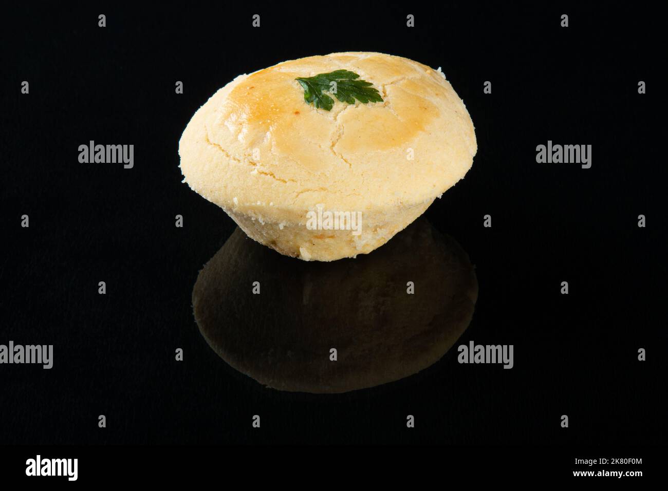Empada. Traditional Brazilian snack of chicken. Isolated on a black ...