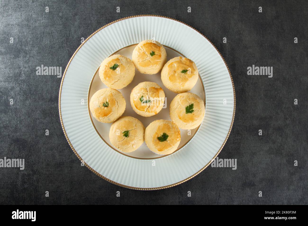 Empada. Traditional Brazilian snack of chicken. Grey background Stock ...