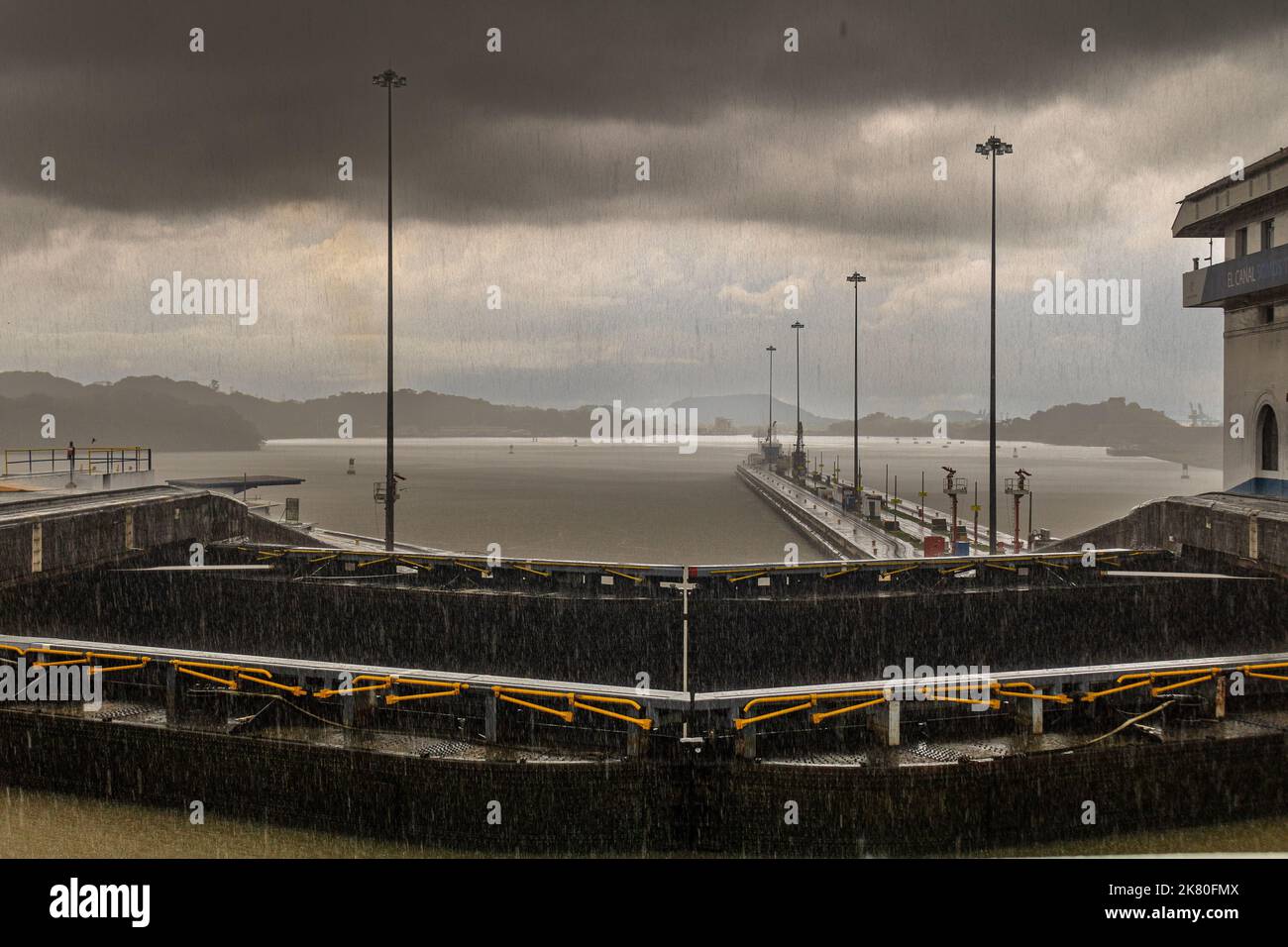 Panama Canal at the Pedro Miguel Locks. Image shows the view of passing ...