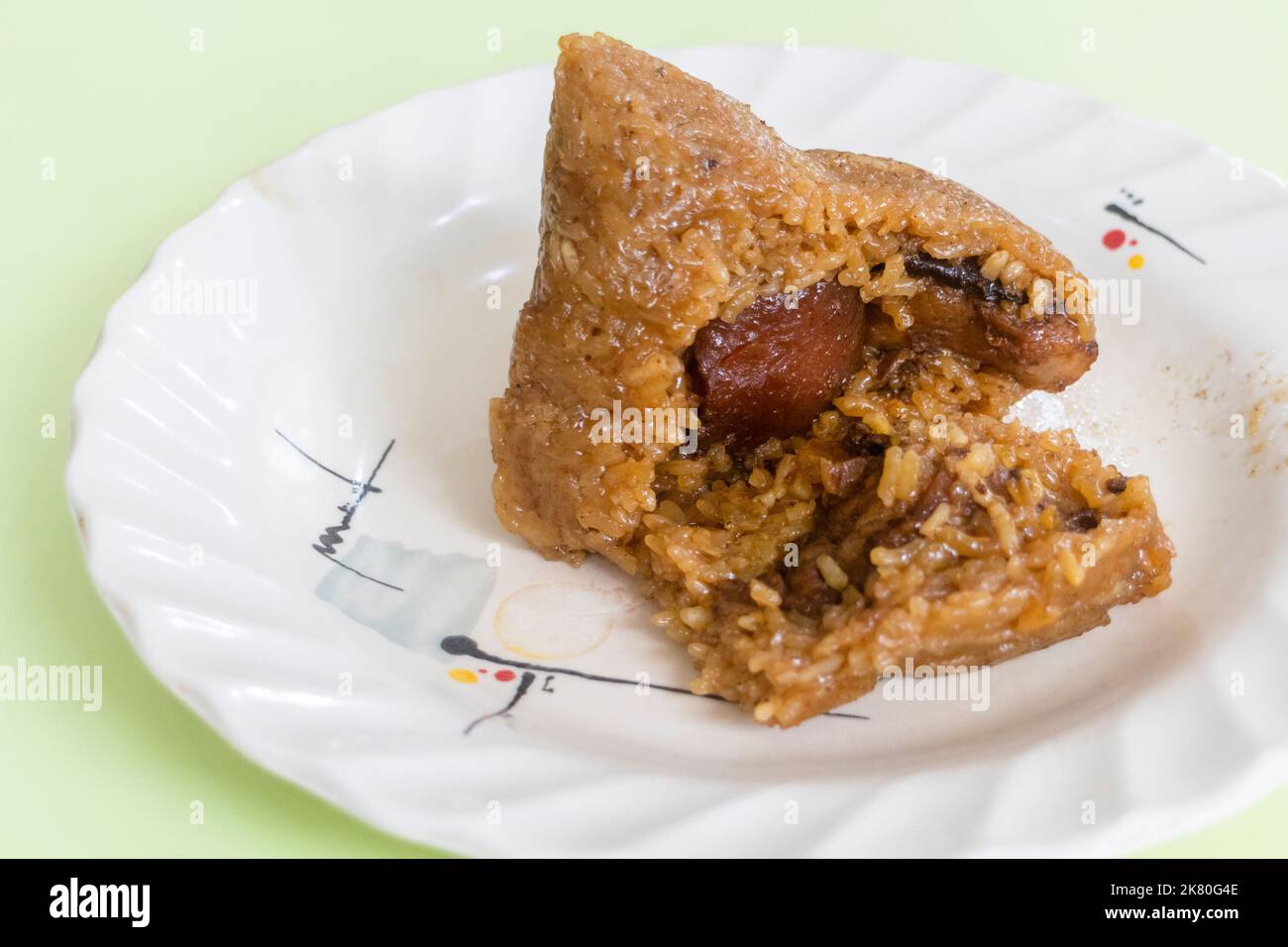 Machang, a Filipino-Chinese food made of glutinous rice stuffed with ...