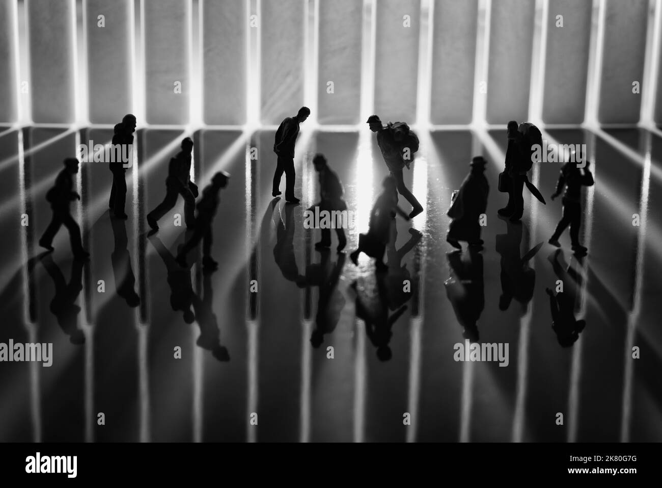 Miniature people toys studio set up - Side view of black and white ...