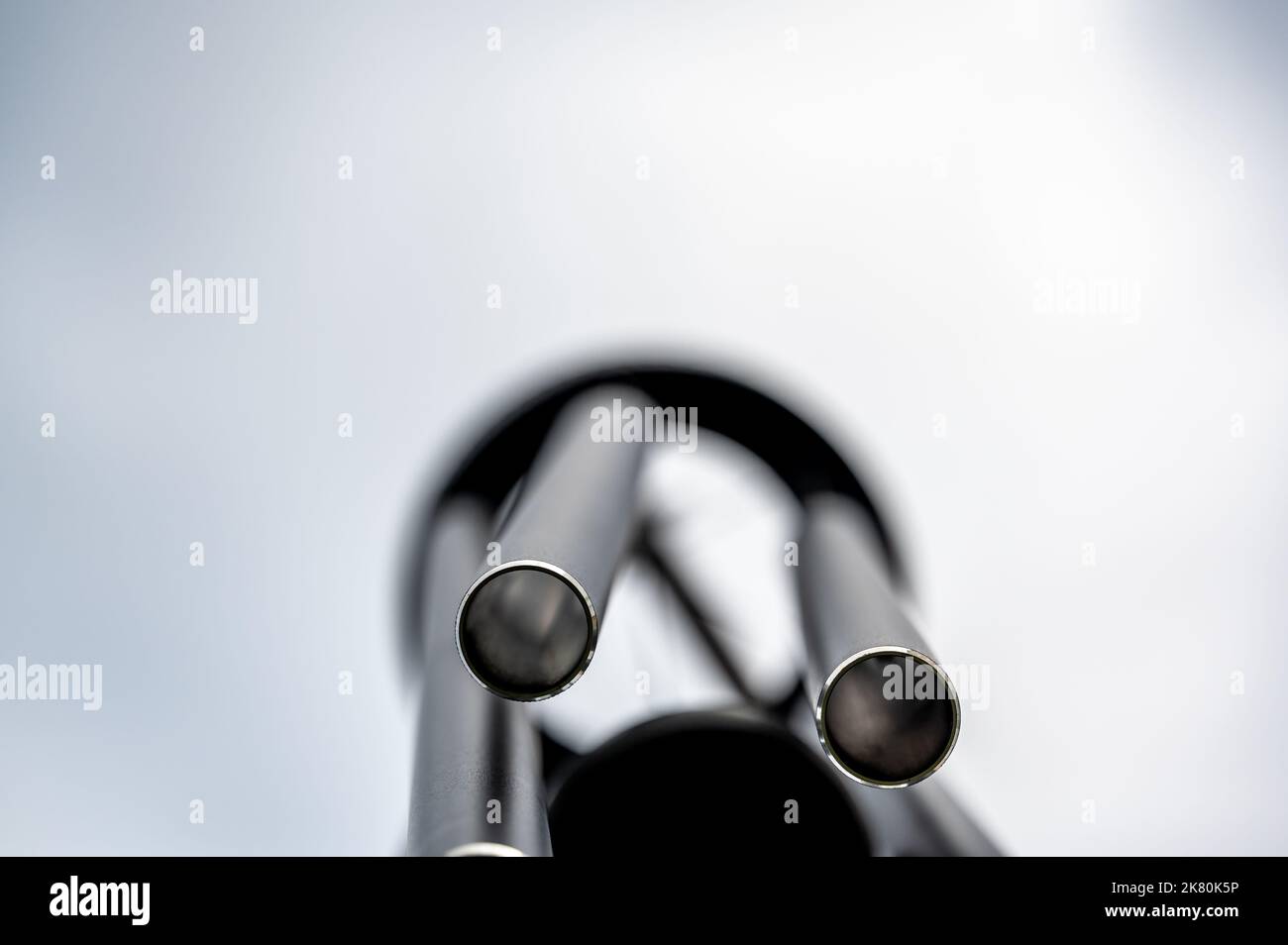 Looking up to the sky underneath a spinning wind chime Stock Photo - Alamy