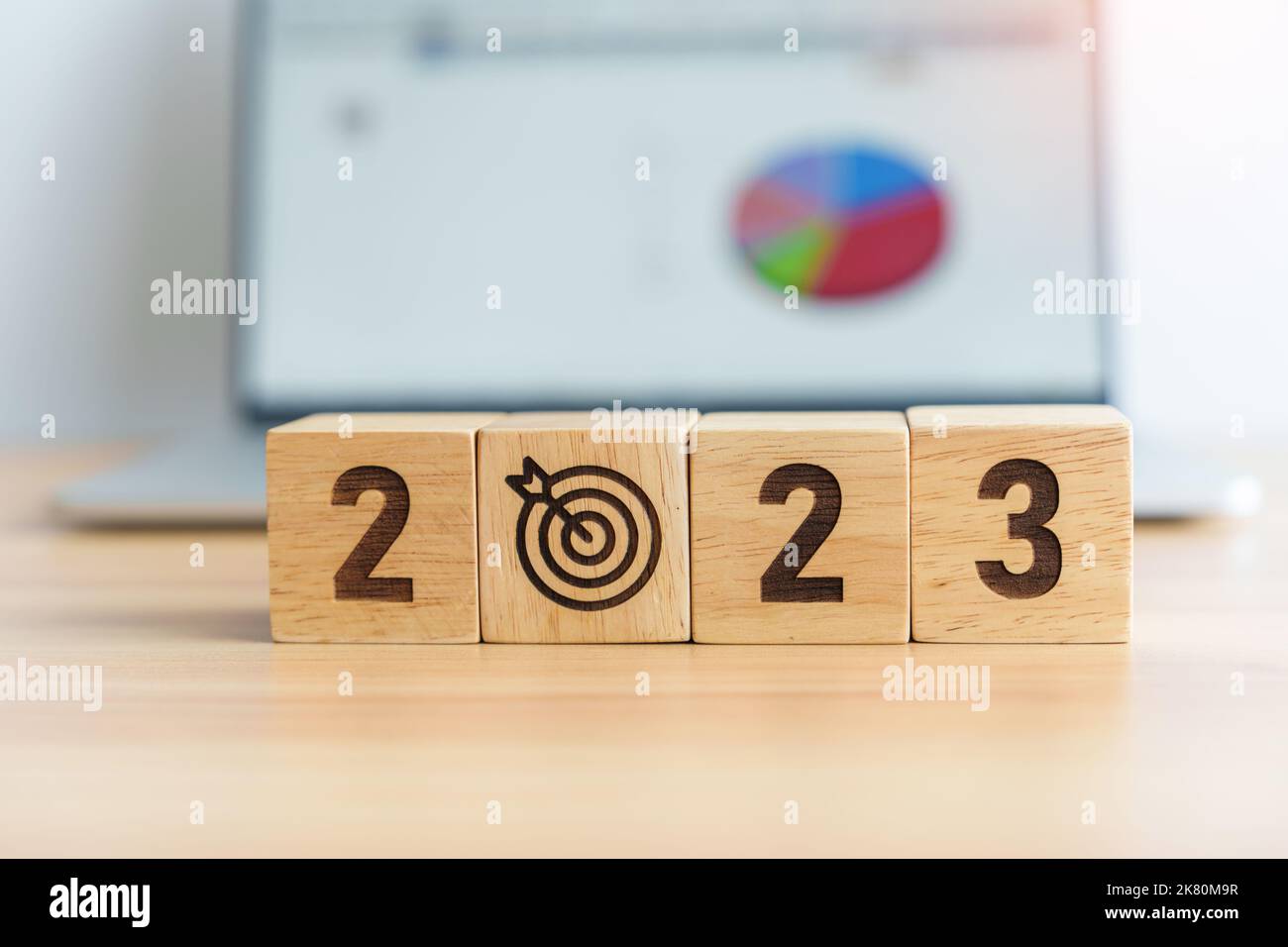 2023 Year block with dartboard icon against computer laptop background. Goal, Target, Resolution ...