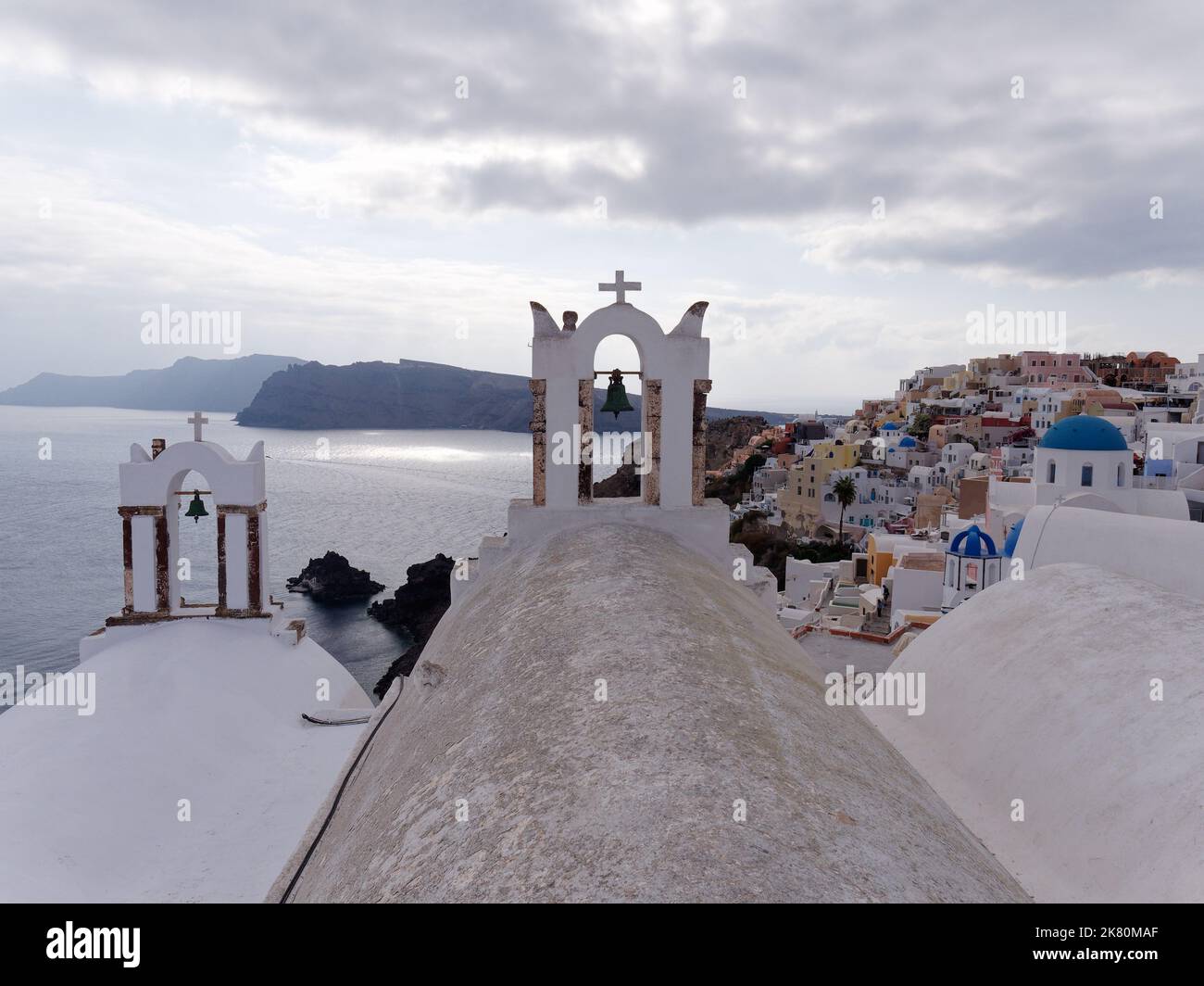 Town of Oia and Caldera view as seen from church roof top with church ...