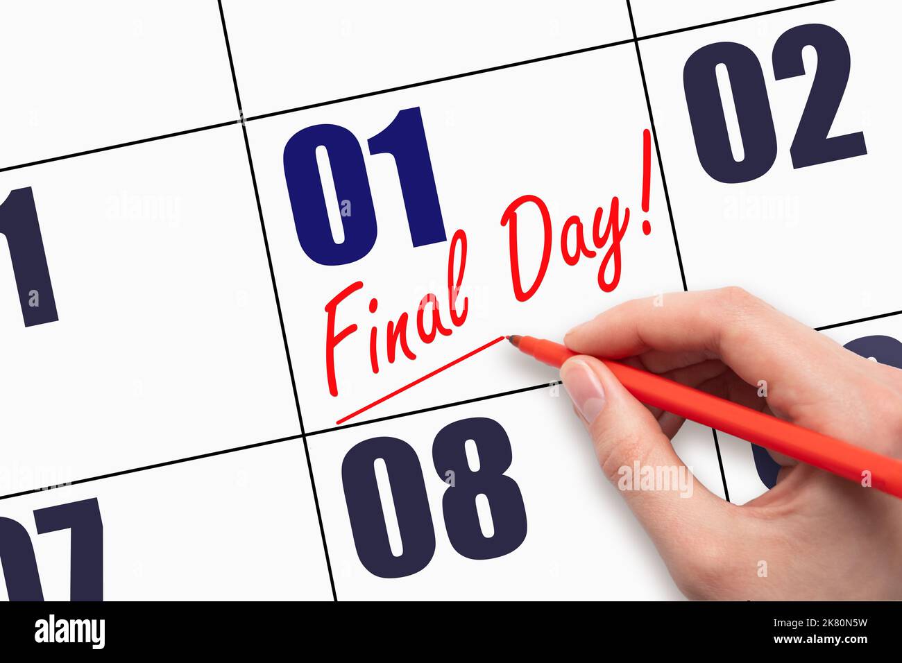 1st day of the month. Hand writing text FINAL DAY and drawing a line on ...