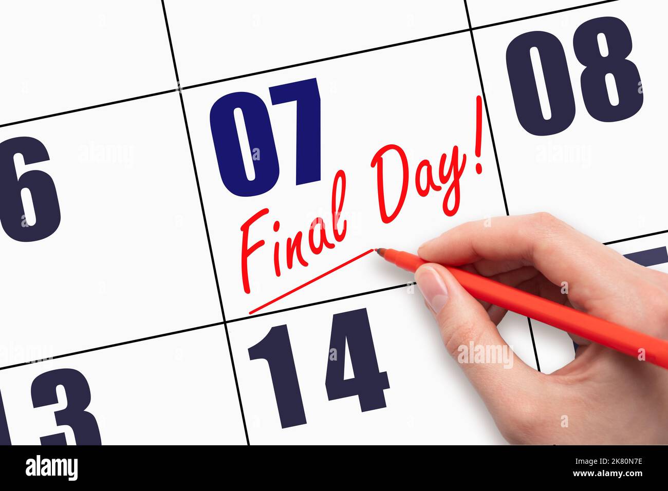 7th day of the month. Hand writing text FINAL DAY and drawing a line on ...