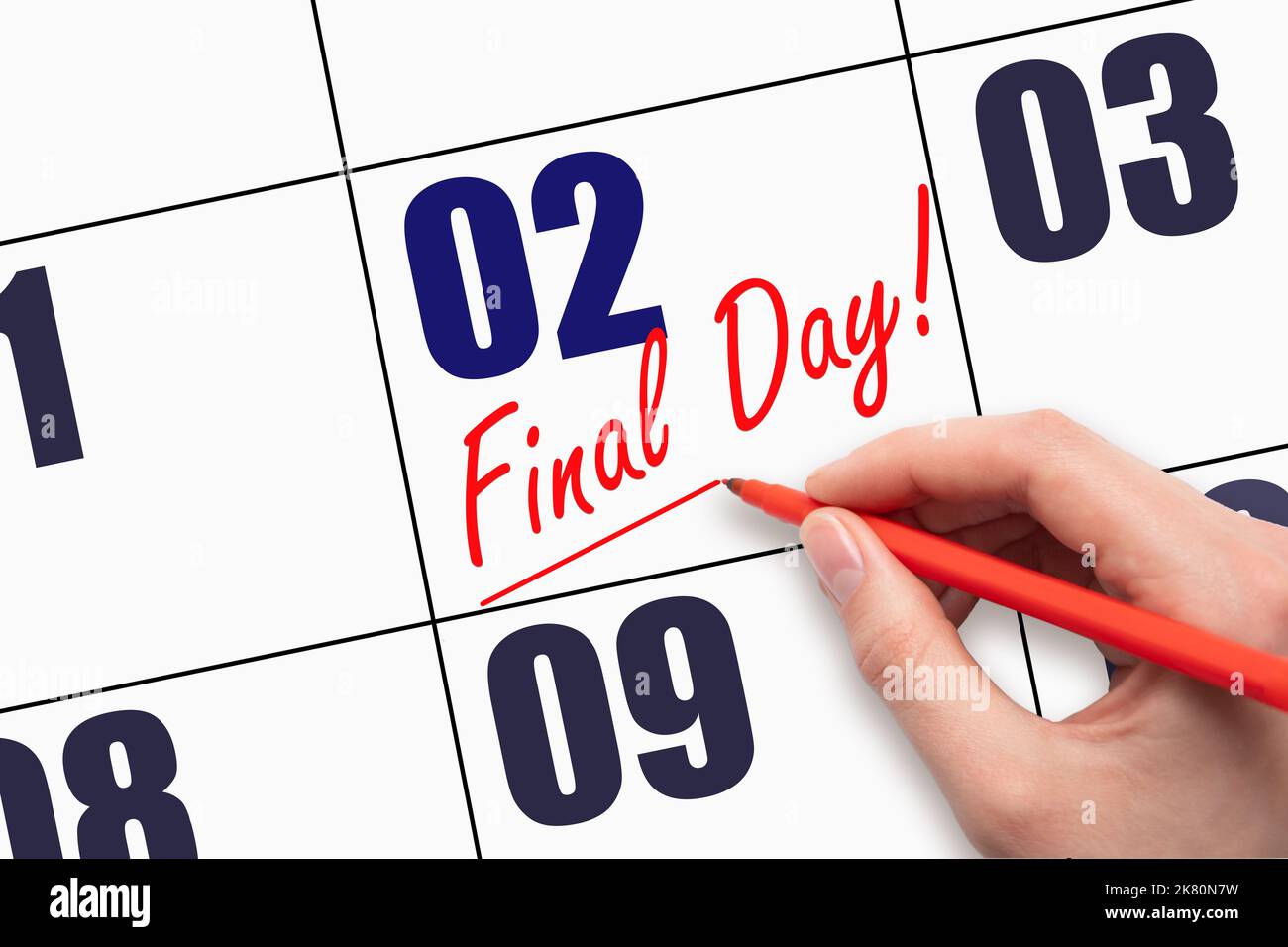 2nd day of the month. Hand writing text FINAL DAY and drawing a line on ...