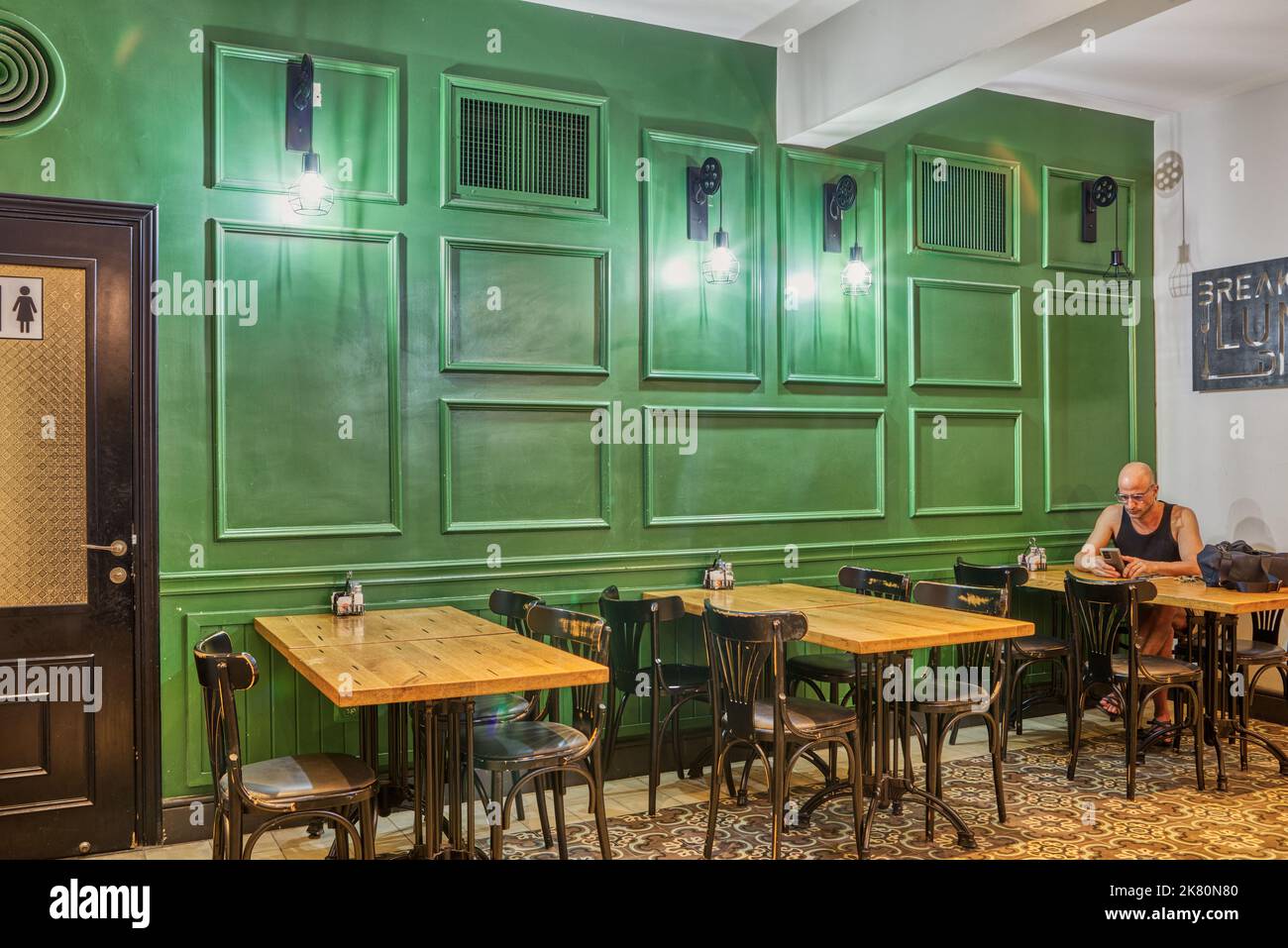 Mediterranean-style cafe with whimsical lighting Stock Photo - Alamy