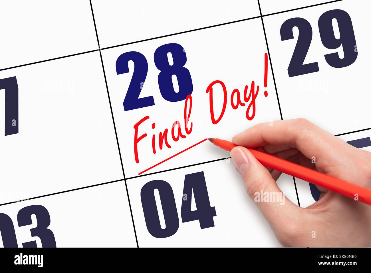 28th day of the month. Hand writing text FINAL DAY and drawing a line ...