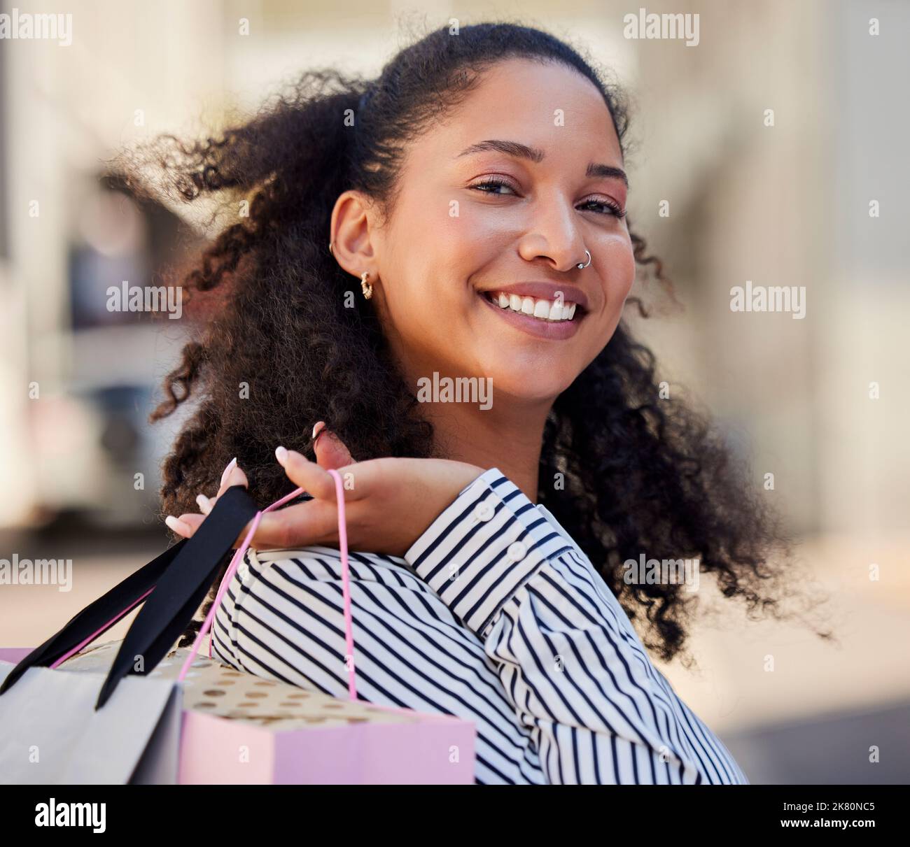 Shopping, rich and woman in urban city for fashion, clothes or retail ...