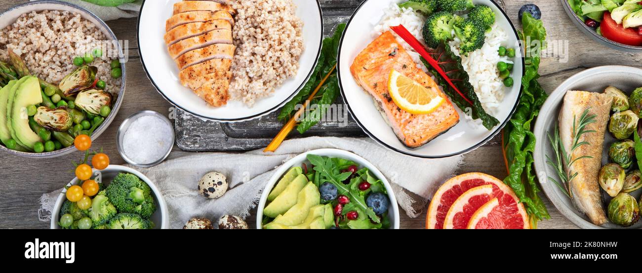 Table of various healthy food dishes. Healthy food assortment. Dieting ...