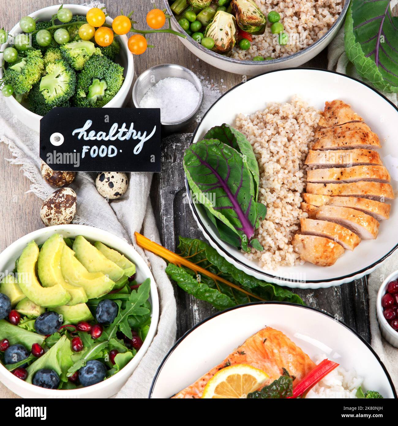 Table of various healthy food dishes. Healthy food assortment. Dieting ...