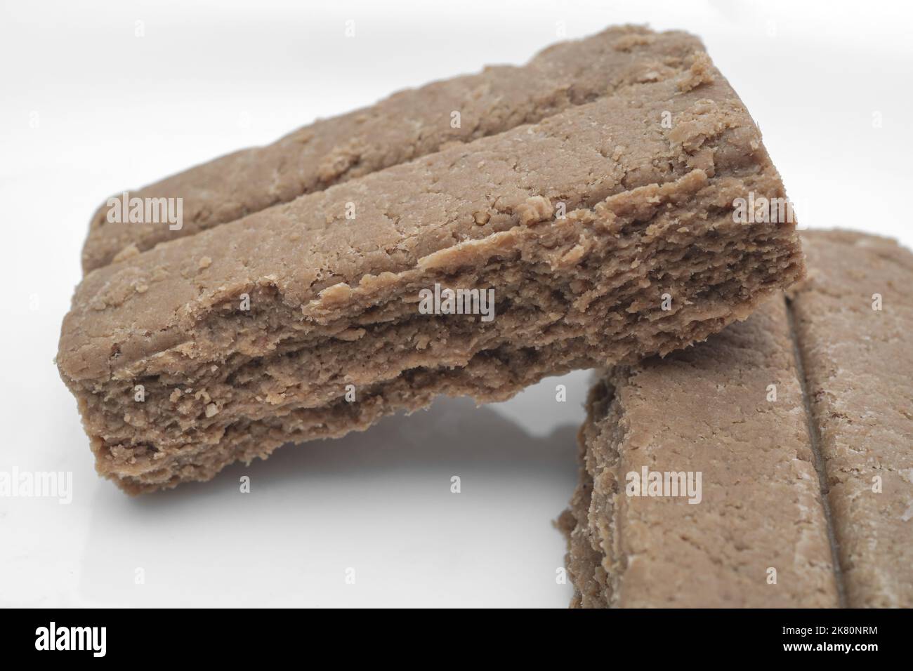Sunflower halva isolated on white background Stock Photo - Alamy