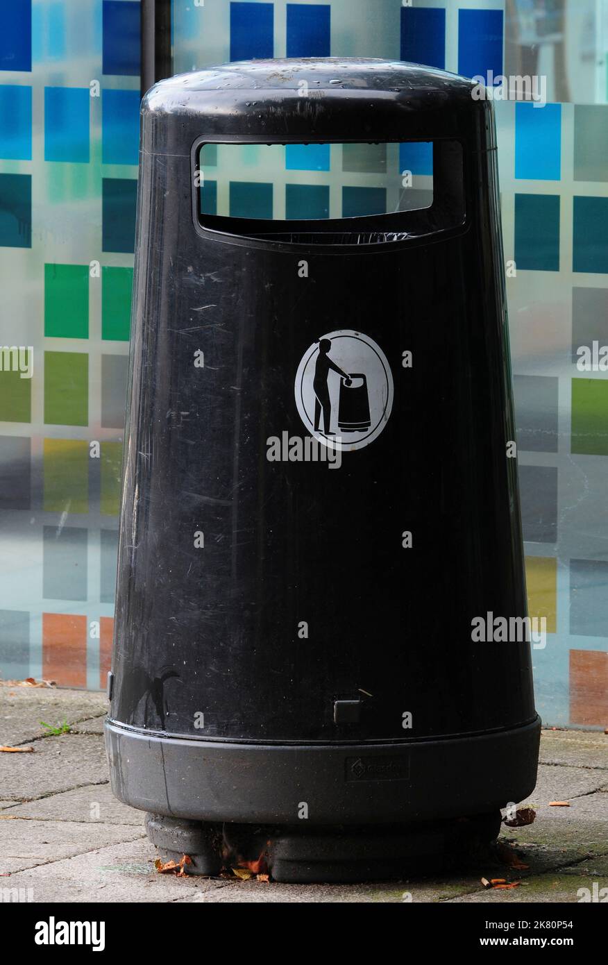 Litter bin in public walkway Stock Photo - Alamy
