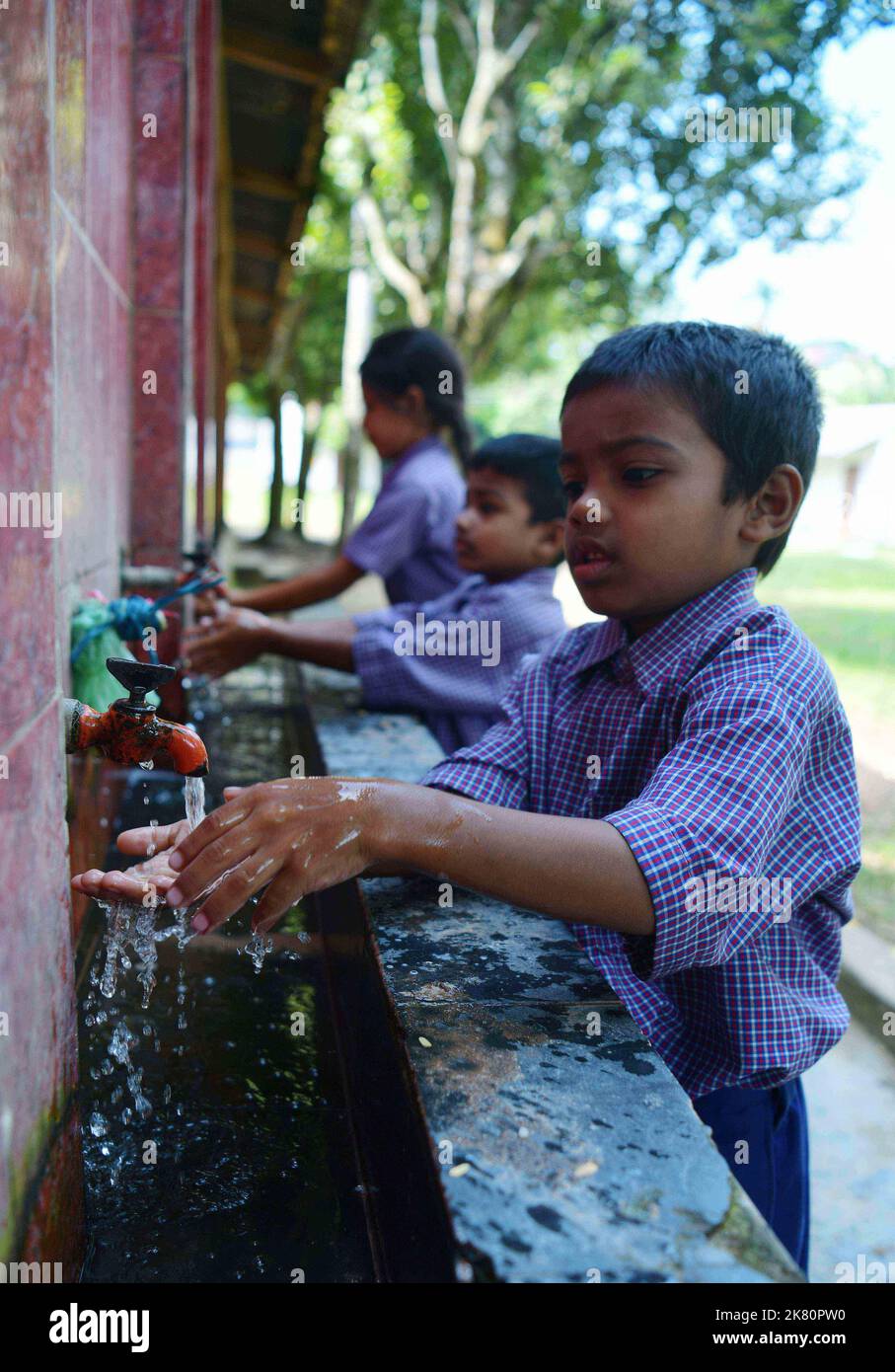 Indian school students washing hand hi-res stock photography and images ...