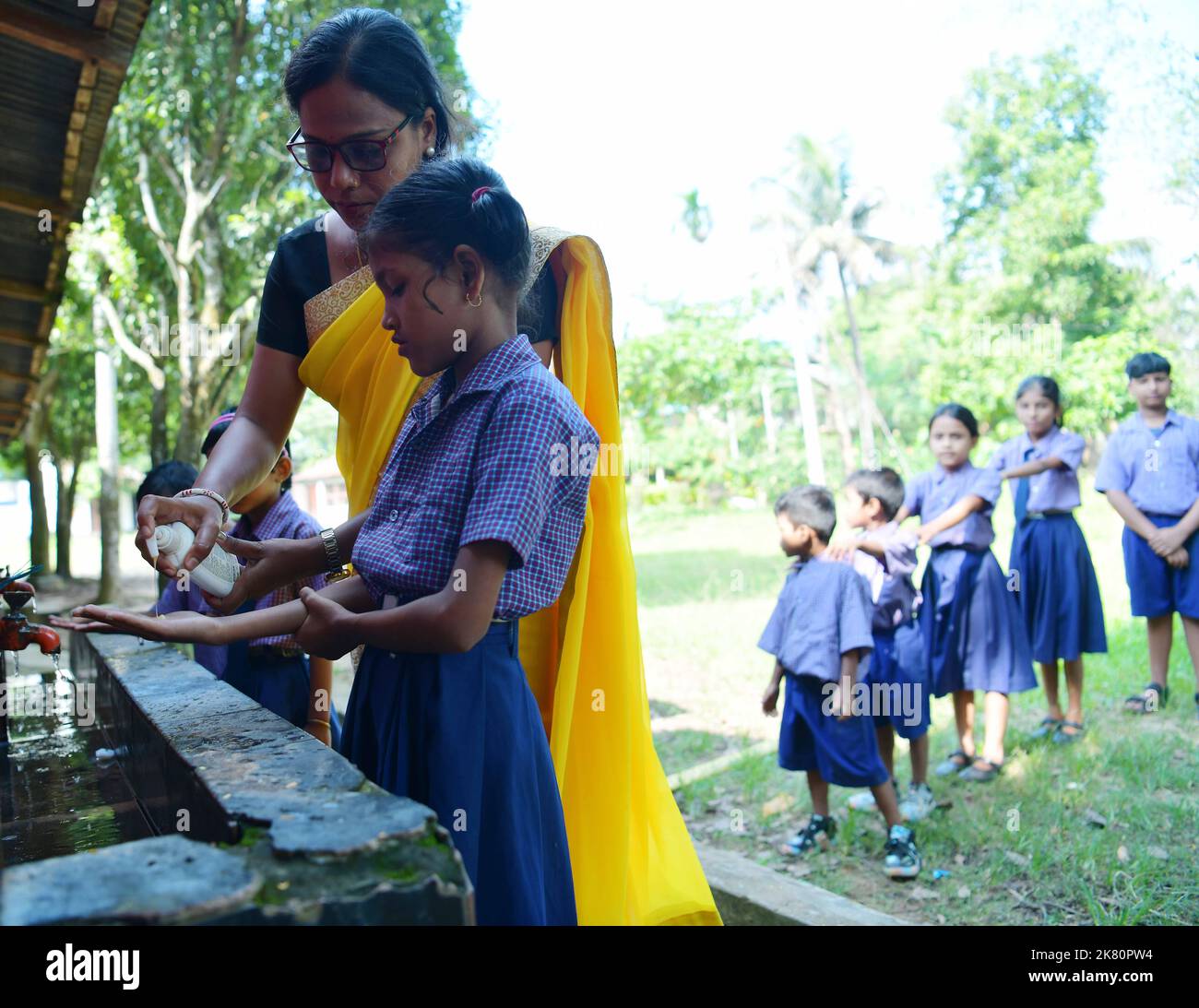 Indian school students washing hand hi-res stock photography and images ...