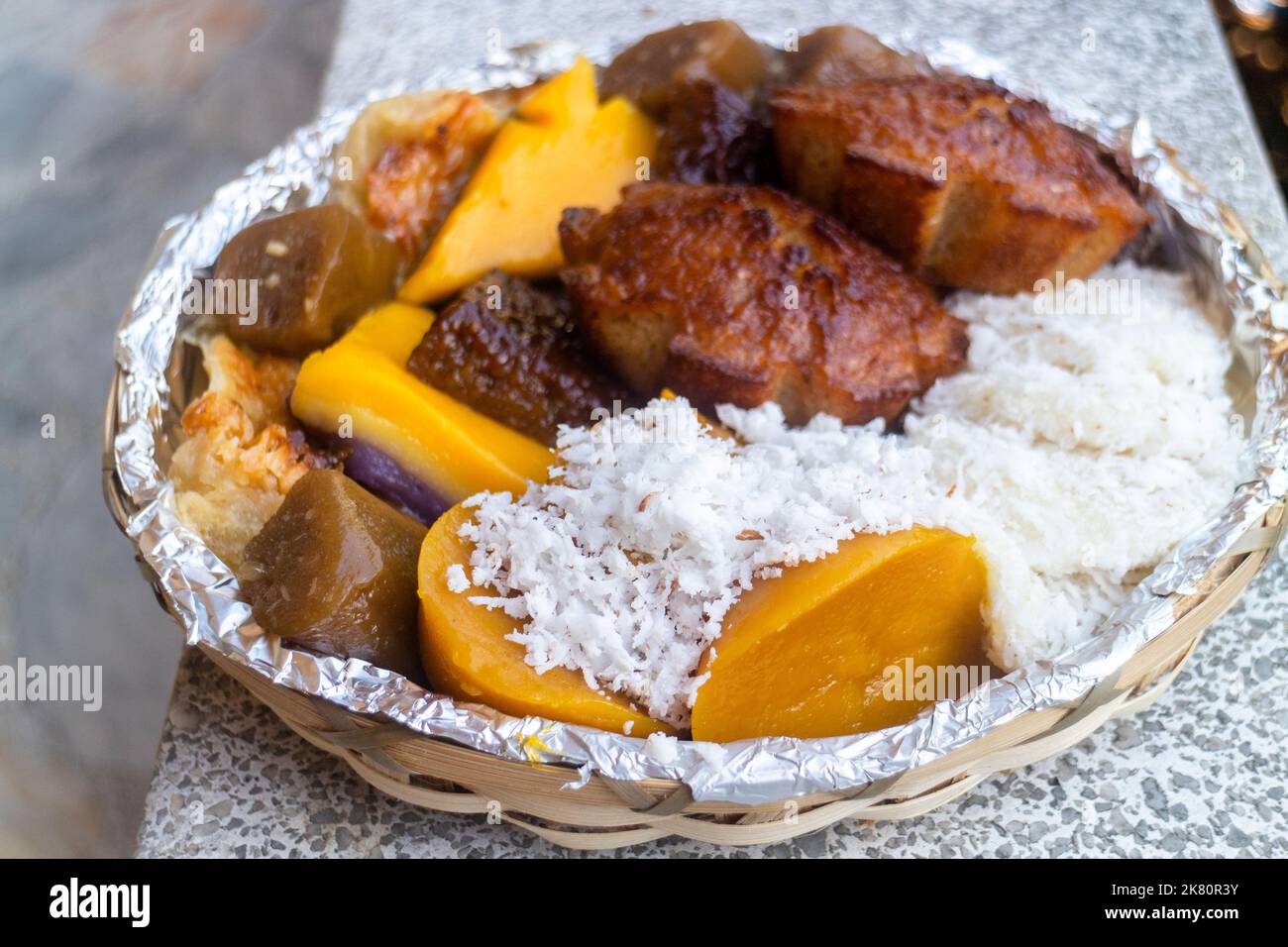 A tray of various kinds of FIlipino rice cake desserts in Cebu ...
