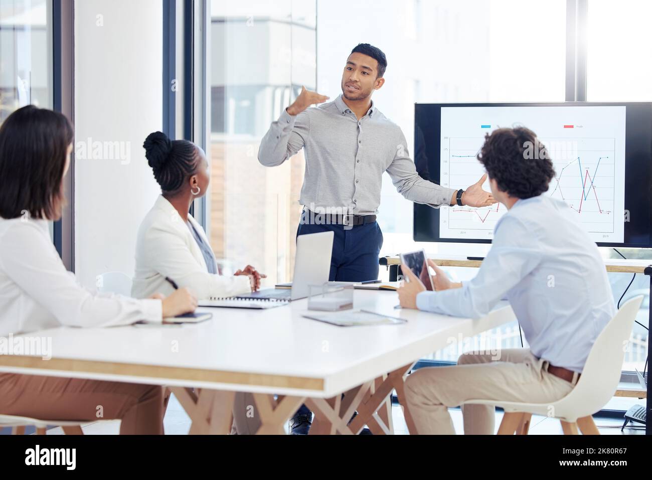 Lets take a look at the diagram. a group of businesspeople having a ...