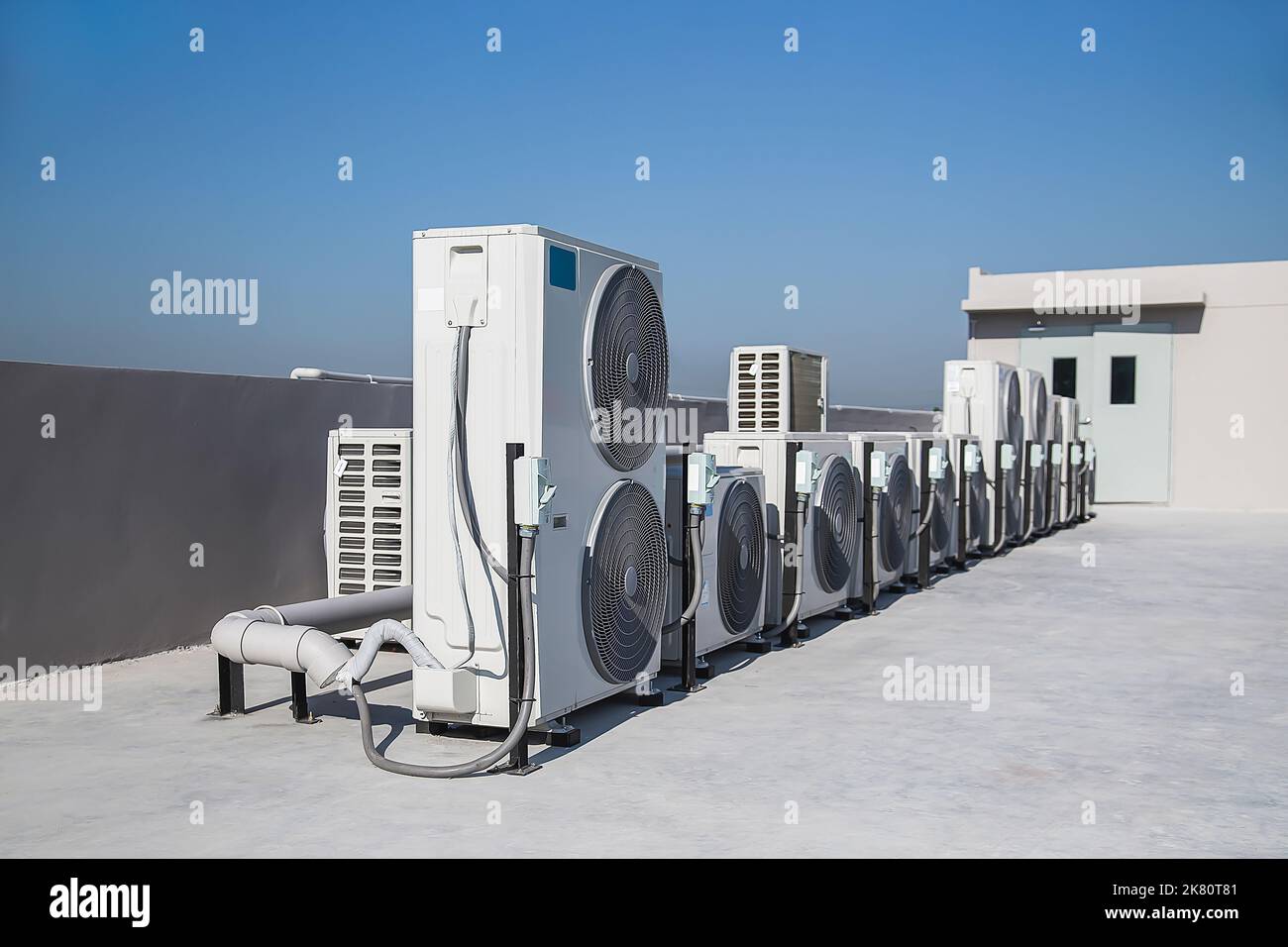 Air conditioning (HVAC) installed on the roof of industrial buildings ...