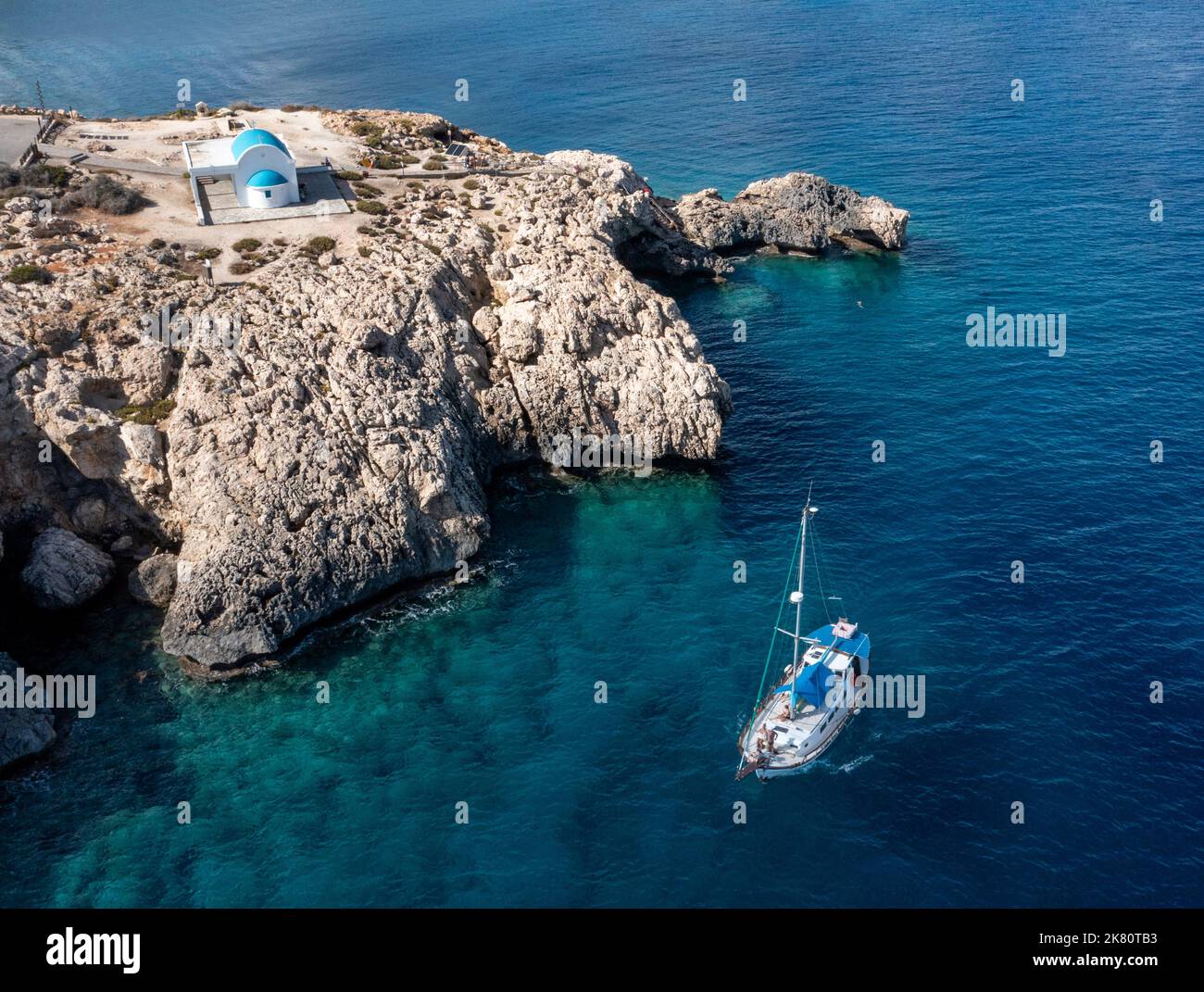 Aerial view of the small chapel of Agioi Anargyroi, Cape Greco National ...