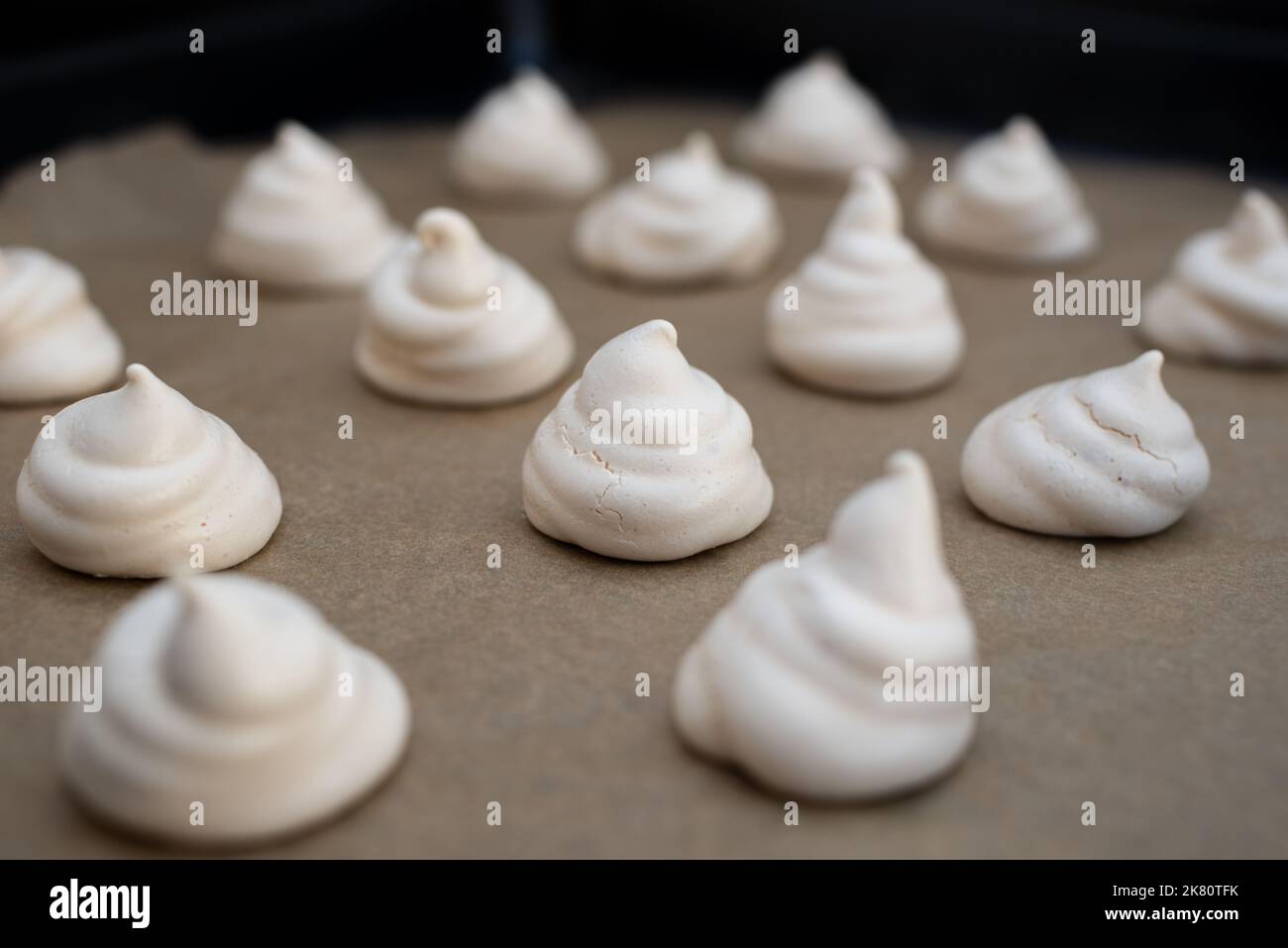 Funny meringue ghosts with funny faces, Halloween dessert Stock Photo ...