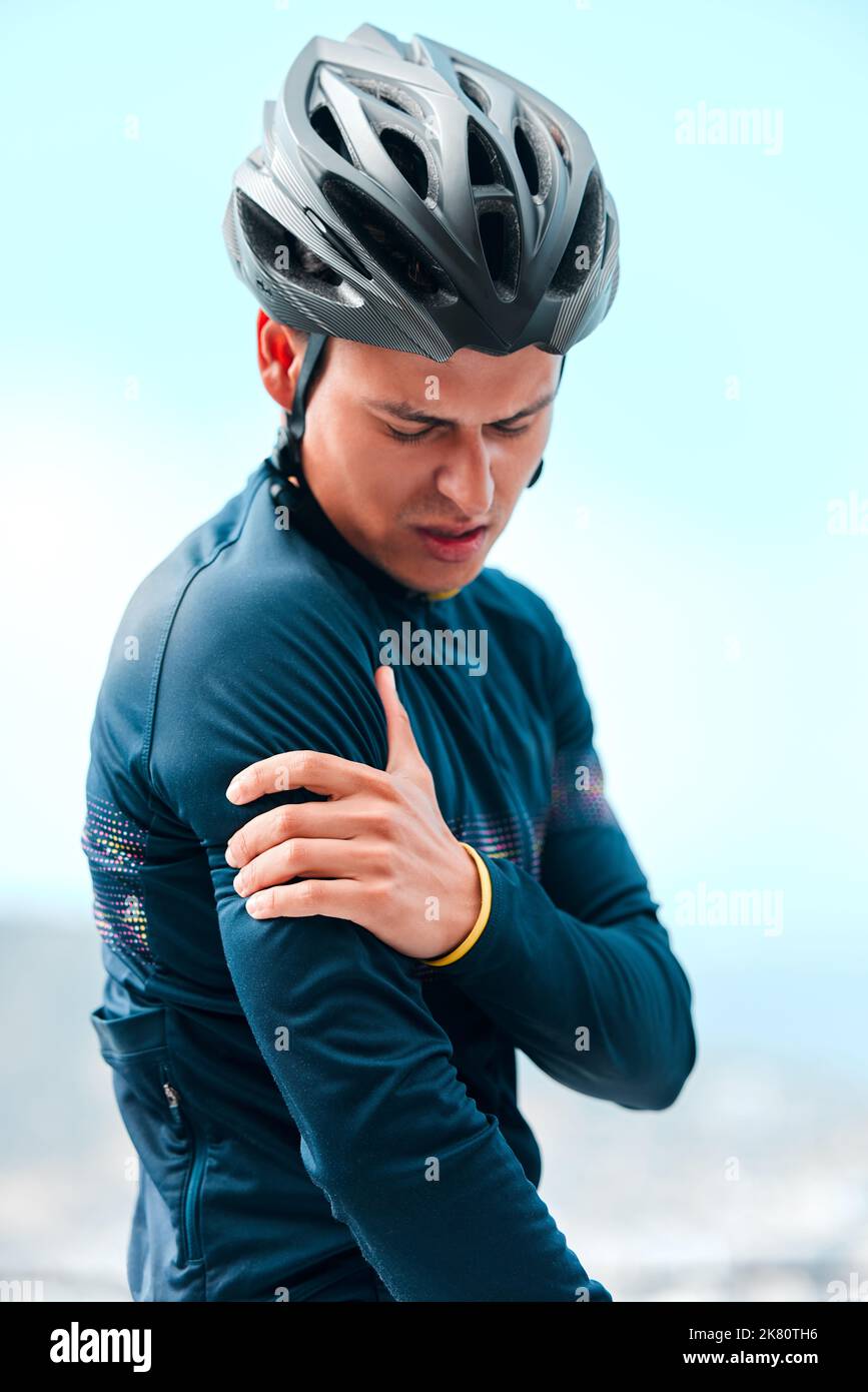Sport, injury and arm pain with man cyclist during exercise routine ...