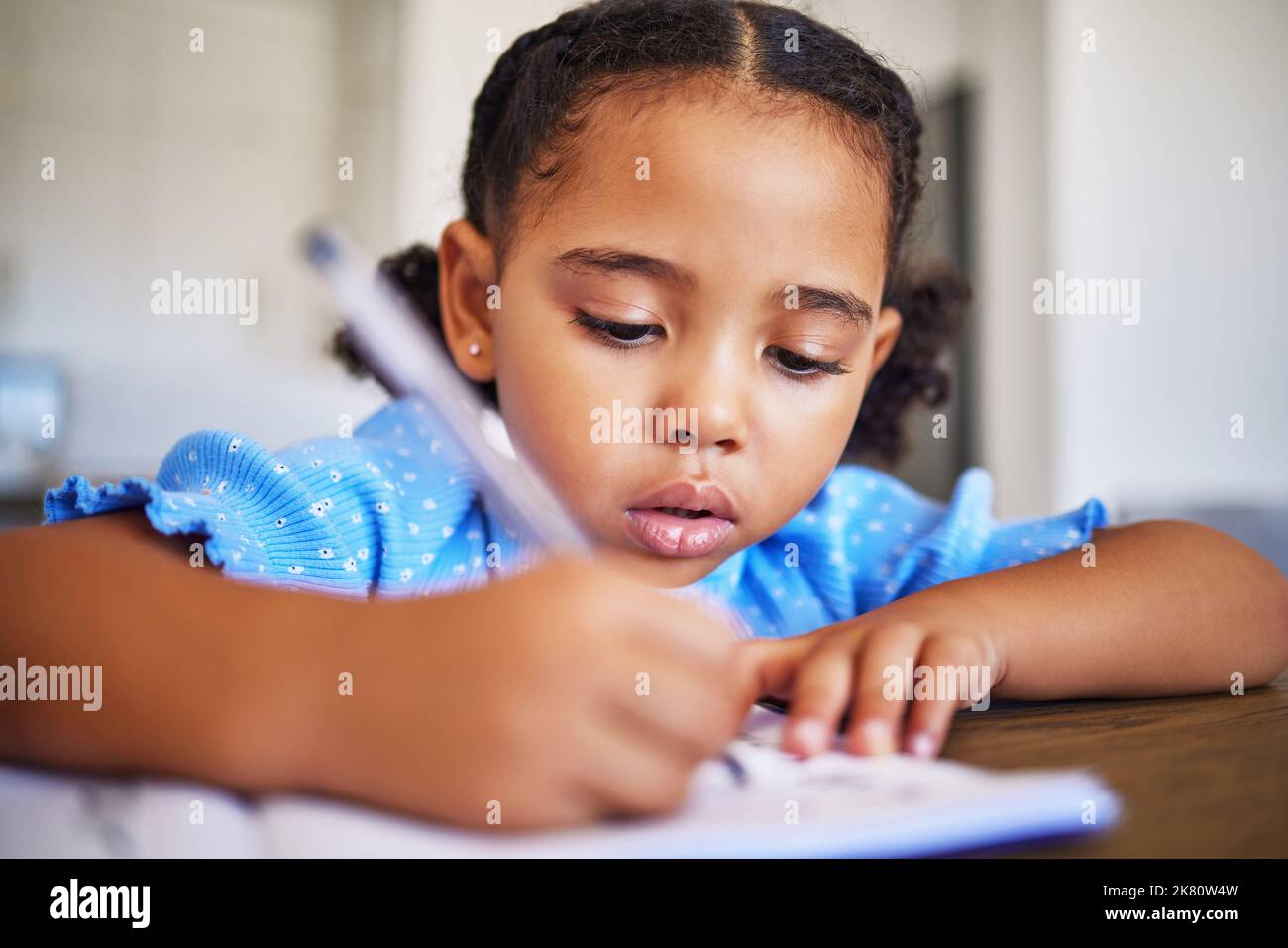 Home, notebook and kid drawing, writing or remote learning for ...