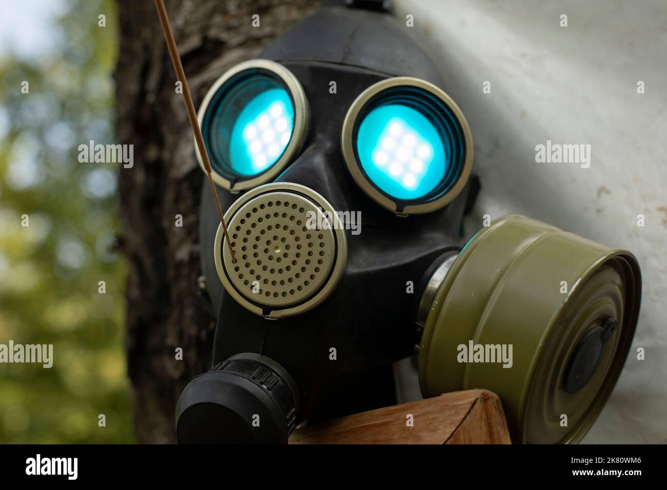 Steam punk gas mask. Glowing eyes at mask. Mask on face from gas ...