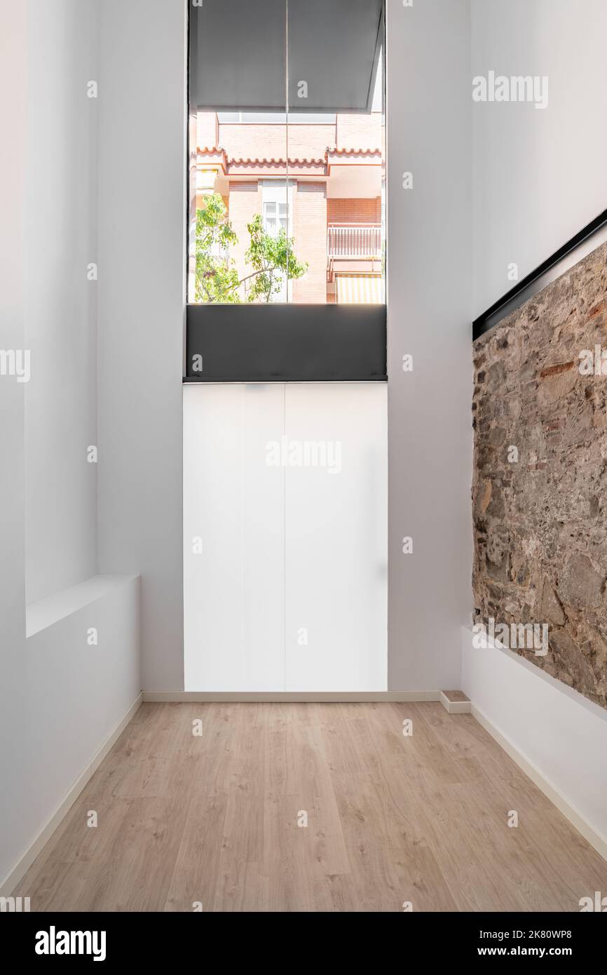 Refurbished apartment with restored ancient wall left from old city ...