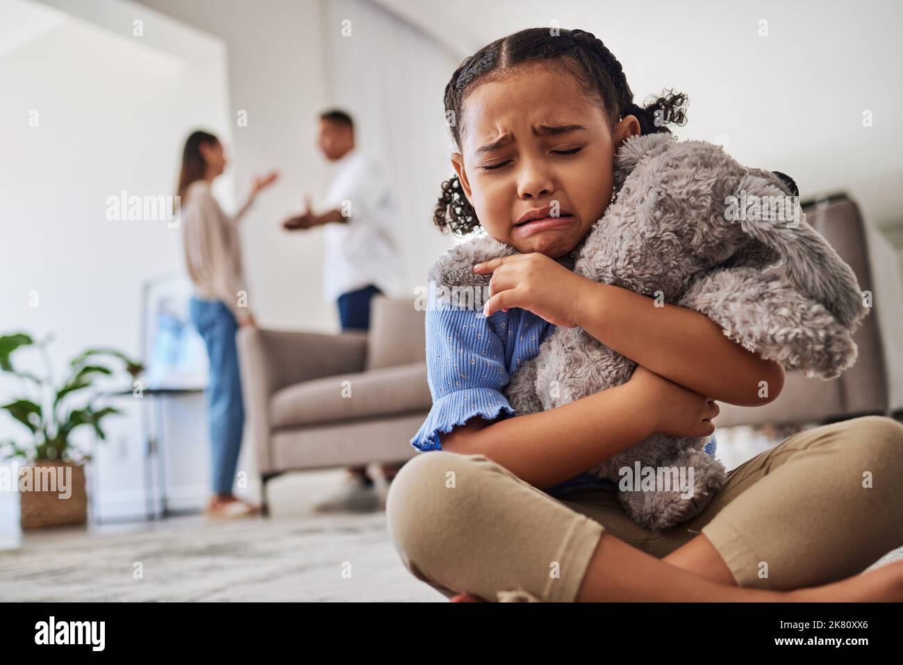 Sad, little girl and crying from parent fight, argument or divorce ...