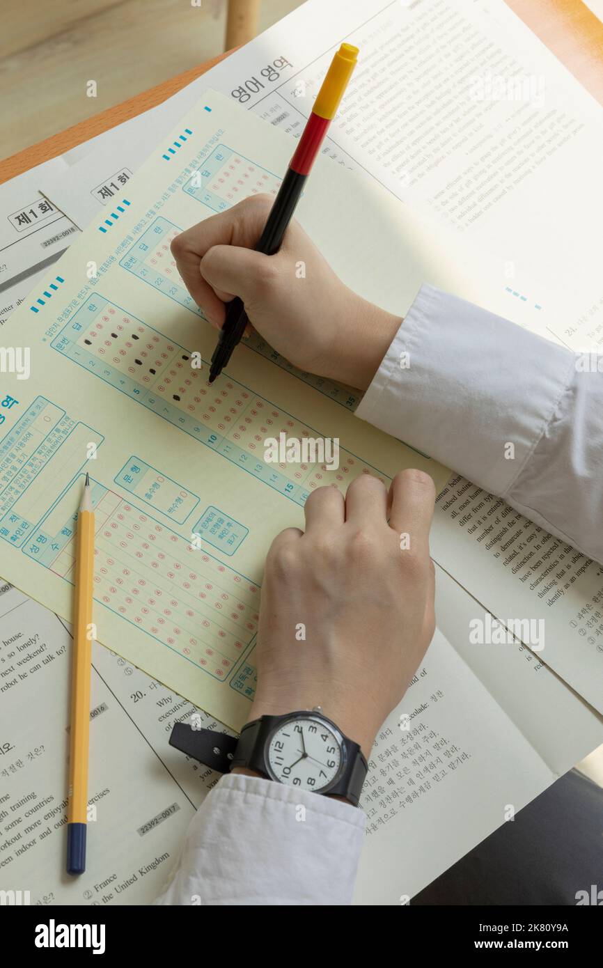 Teenager checking the time school hi-res stock photography and images ...