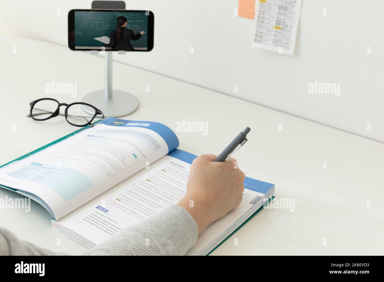 studying at home, study desk setup watching video lectures Stock Photo ...