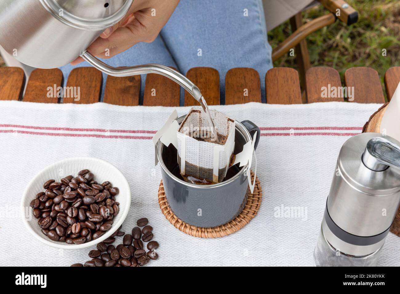 camping mood aesthetics making drip coffee Stock Photo - Alamy
