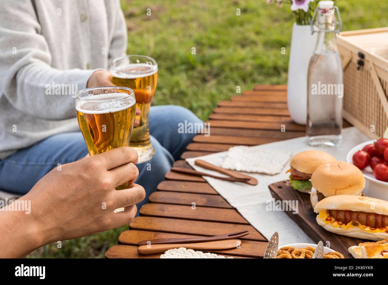 camping mood aesthetics drinking beer Stock Photo - Alamy