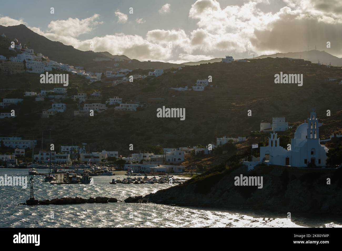 Panoramic view of the church Agia Irini, the port and the village of ...