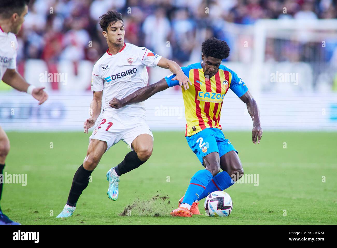 Oliver Torres of Sevilla FC and Thierry Correia of Valencia during the ...