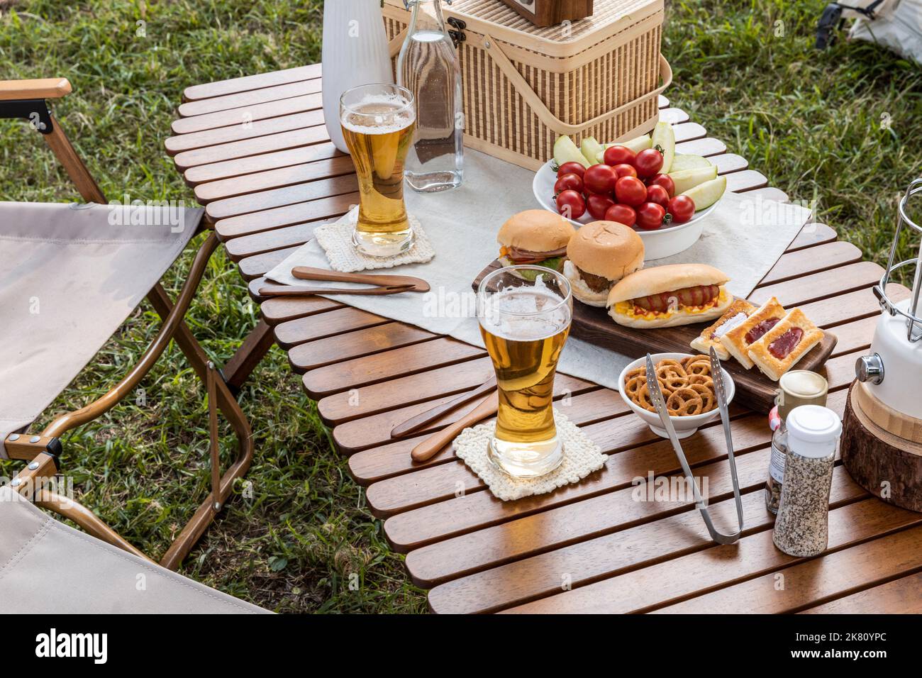 camping mood aesthetics beer and side dishes served on the tablet Stock ...