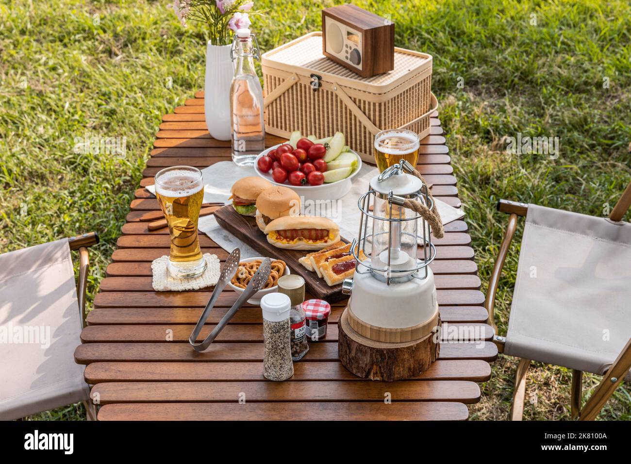 camping mood aesthetics beer and side dishes served on the tablet Stock ...