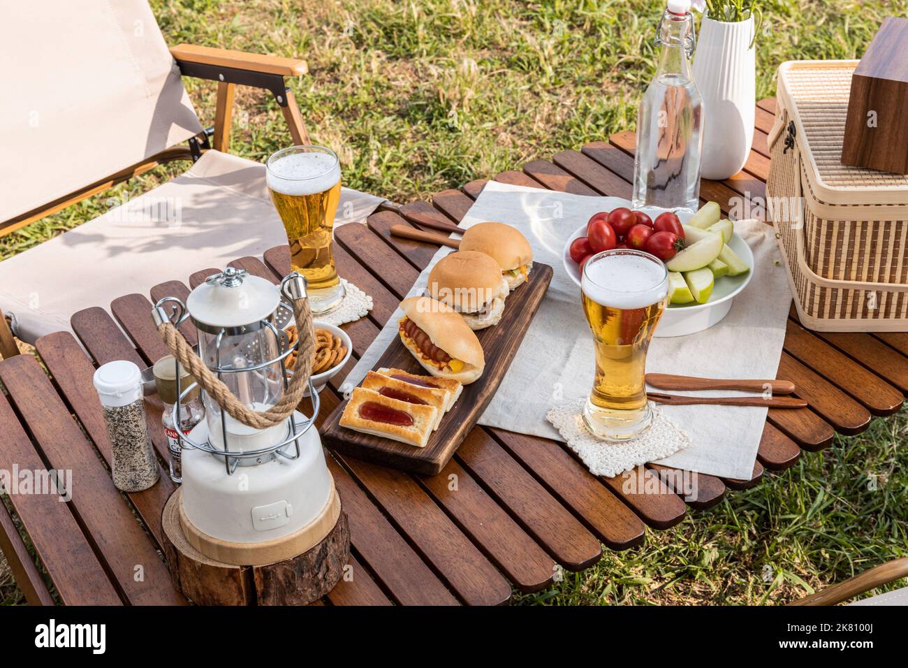 camping mood aesthetics beer and side dishes served on the tablet Stock ...