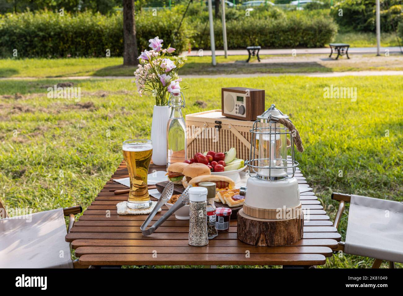 camping mood aesthetics beer and side dishes served on the tablet Stock ...
