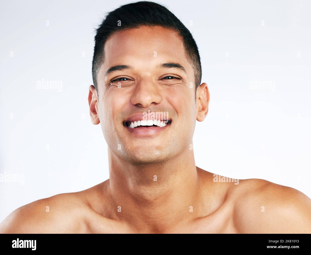 Happy man, skincare and body care after dermatology, cleaning and ...