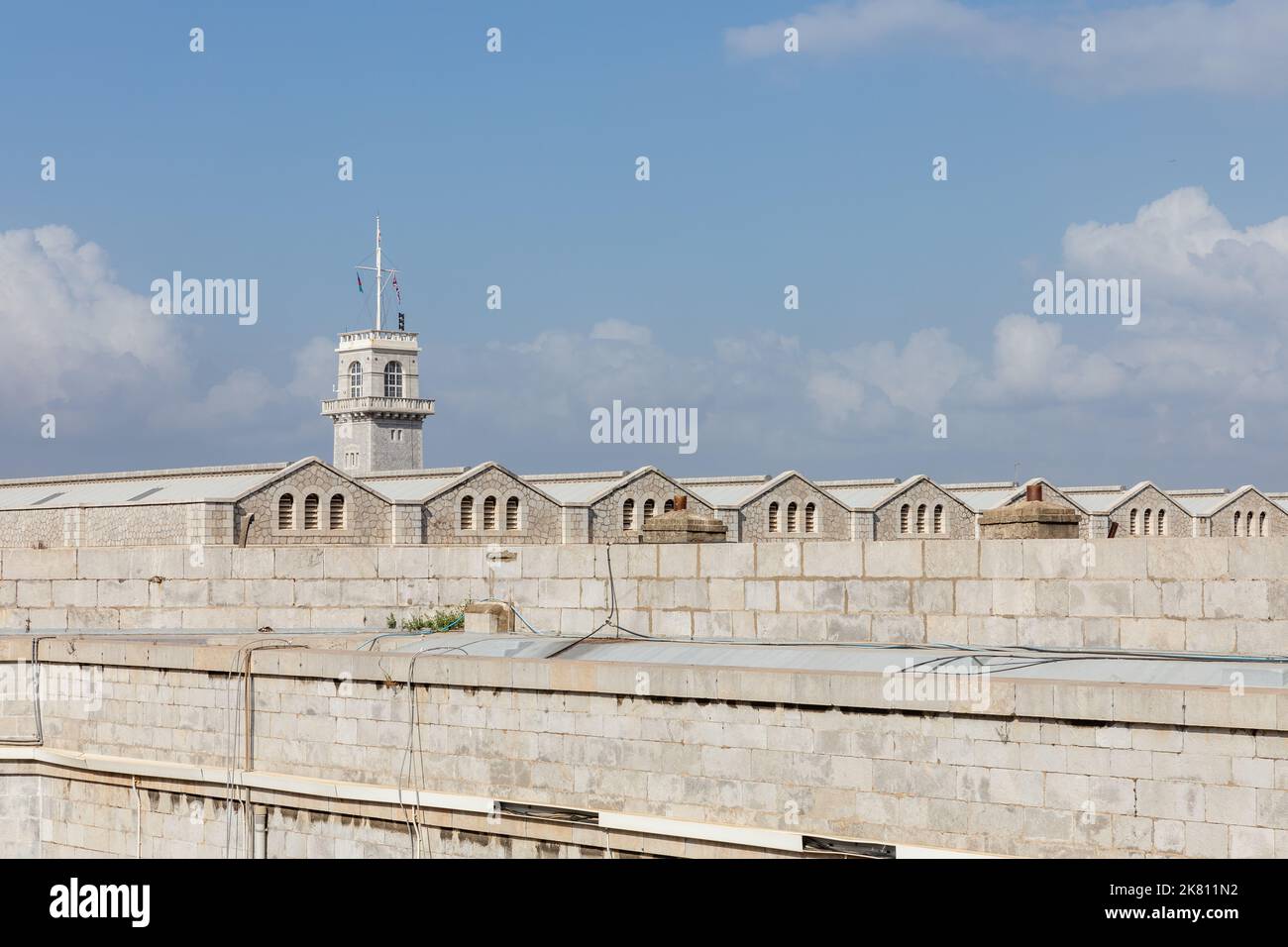 Harbor and the Bay of Gibraltar with its colorful rail cranes ...