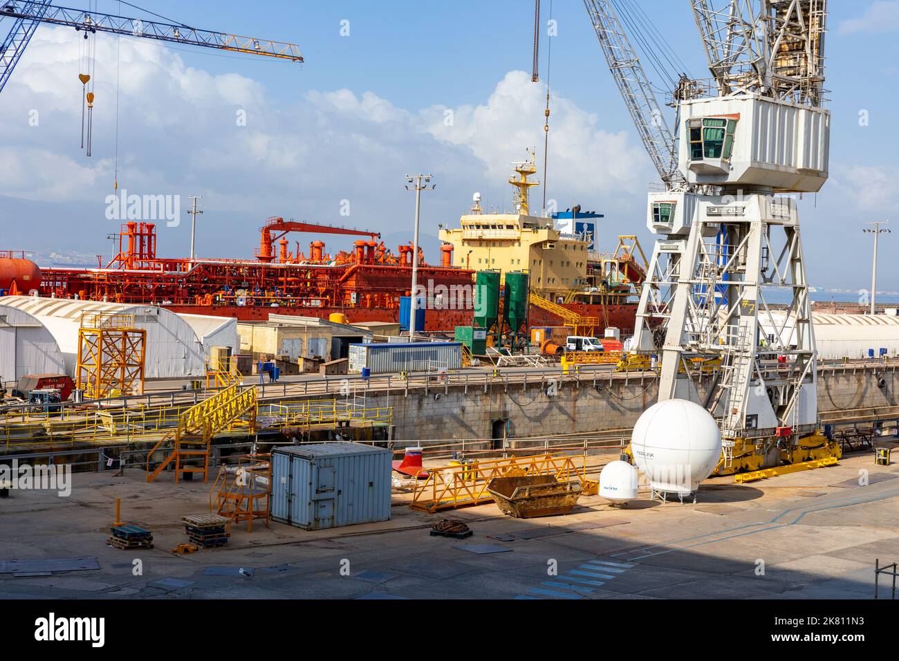 Harbor and the Bay of Gibraltar with its colorful rail cranes ...