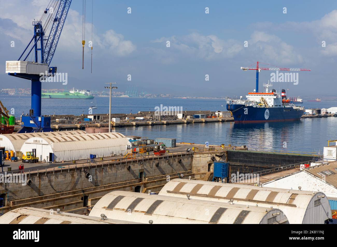 Harbor and the Bay of Gibraltar with its colorful rail cranes ...
