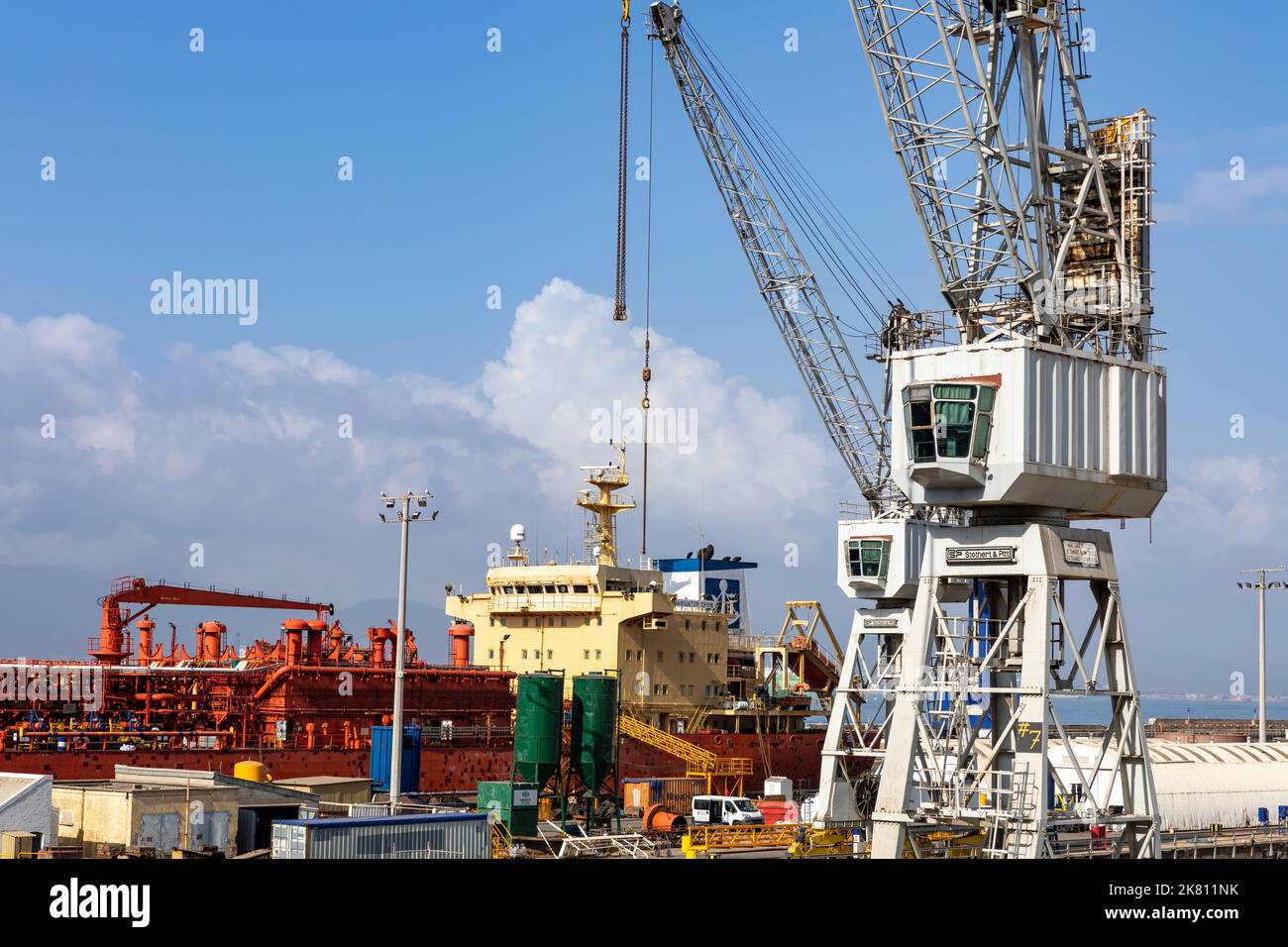 Harbor and the Bay of Gibraltar with its colorful rail cranes ...