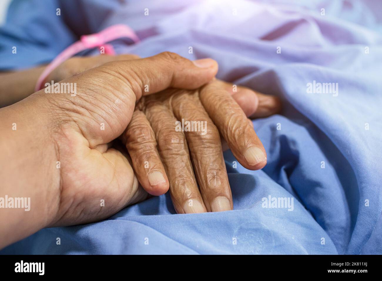 Women sad in hospital bed hi-res stock photography and images - Alamy